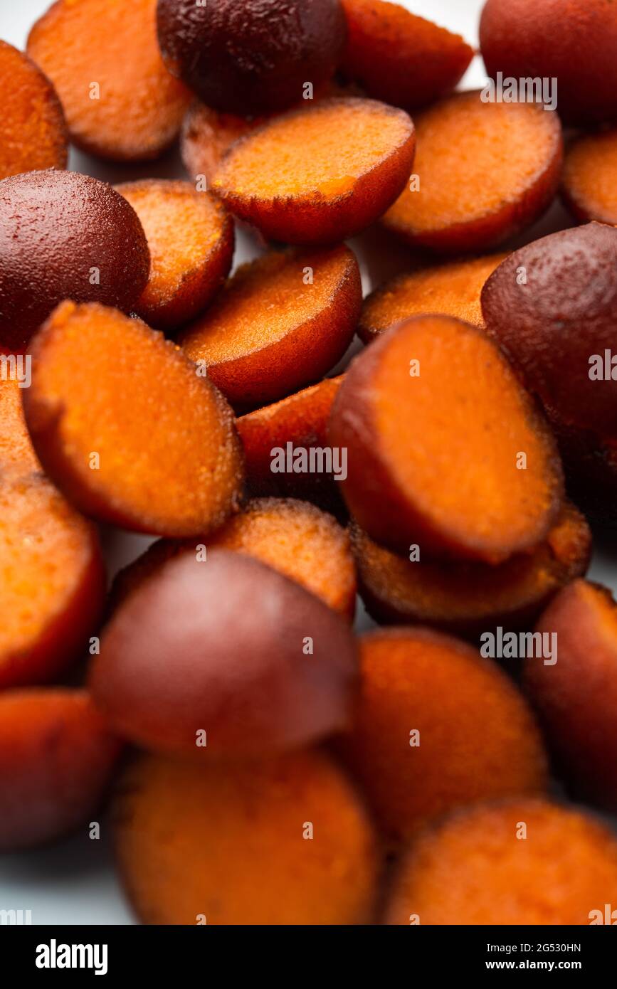 Gulab jamun is a milk-solid-based sweet dumpling popular in India ...