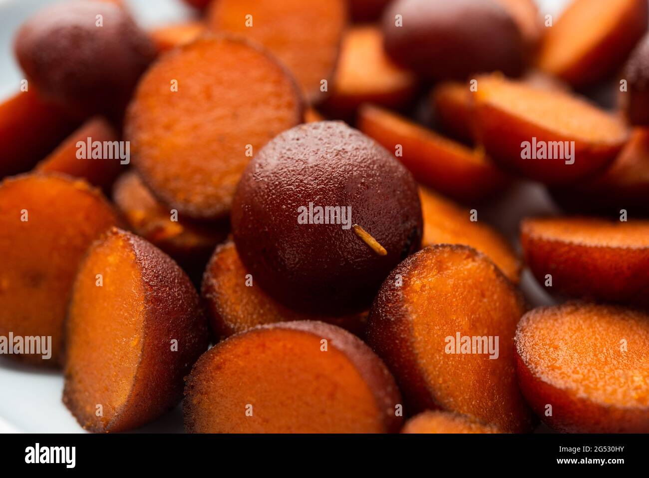 Gulab jamun is a milk-solid-based sweet dumpling popular in India ...