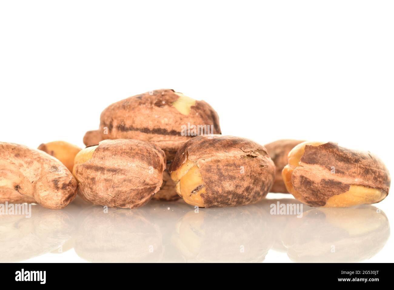 Fragrant fried salted cashews, close-up, isolated on white Stock Photo ...
