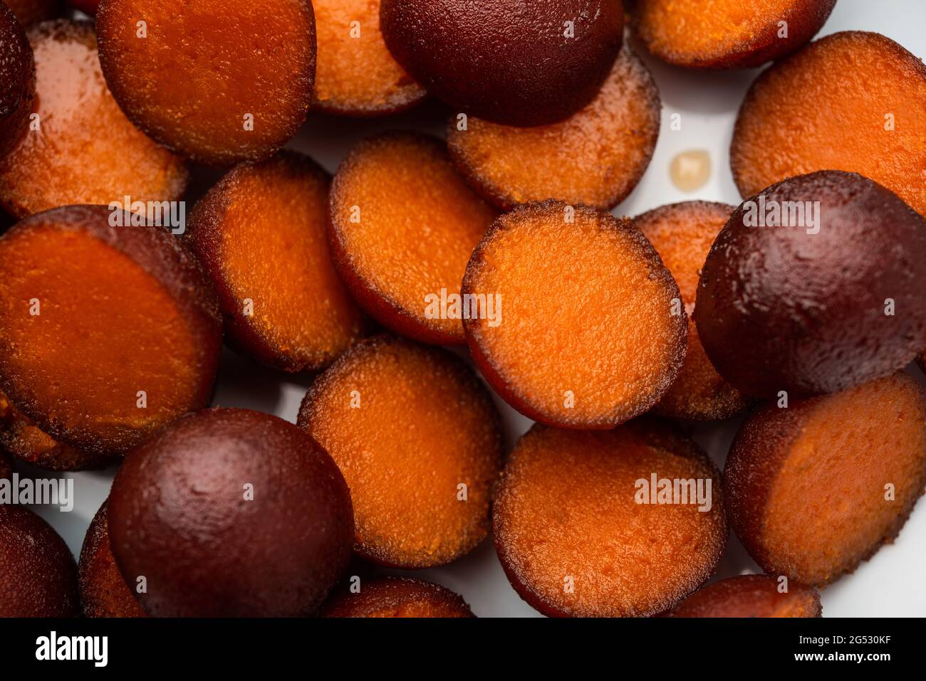 Gulab jamun is a milk-solid-based sweet dumpling popular in India ...
