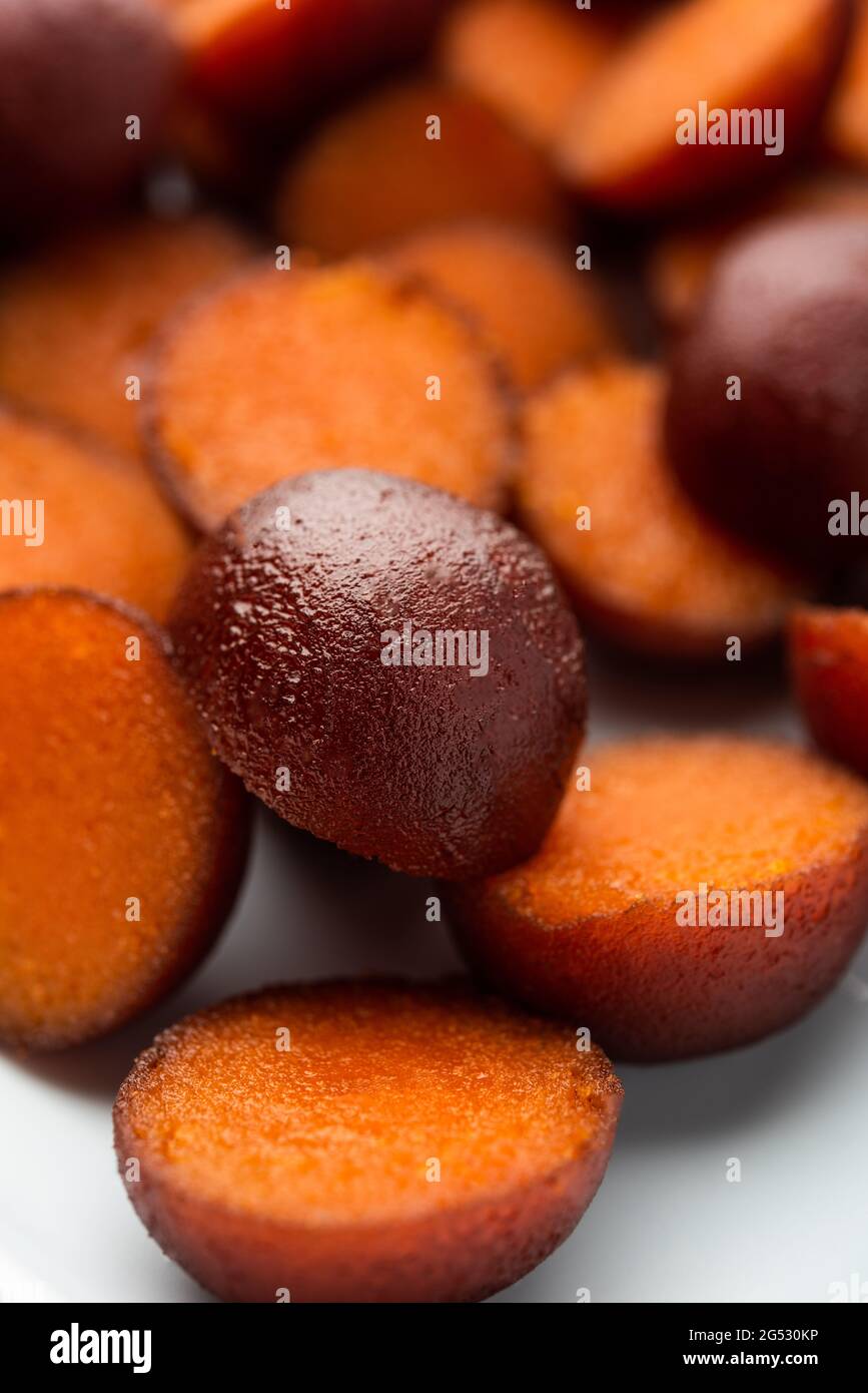 Gulab jamun is a milk-solid-based sweet dumpling popular in India ...