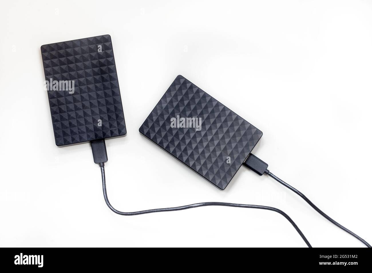 External hard disk drive isolated on white background, modern design ...