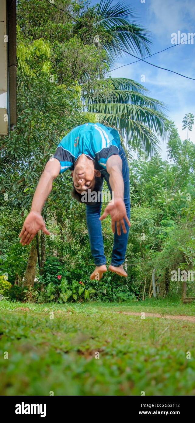 A man jumping dance on ground Stock Photo - Alamy