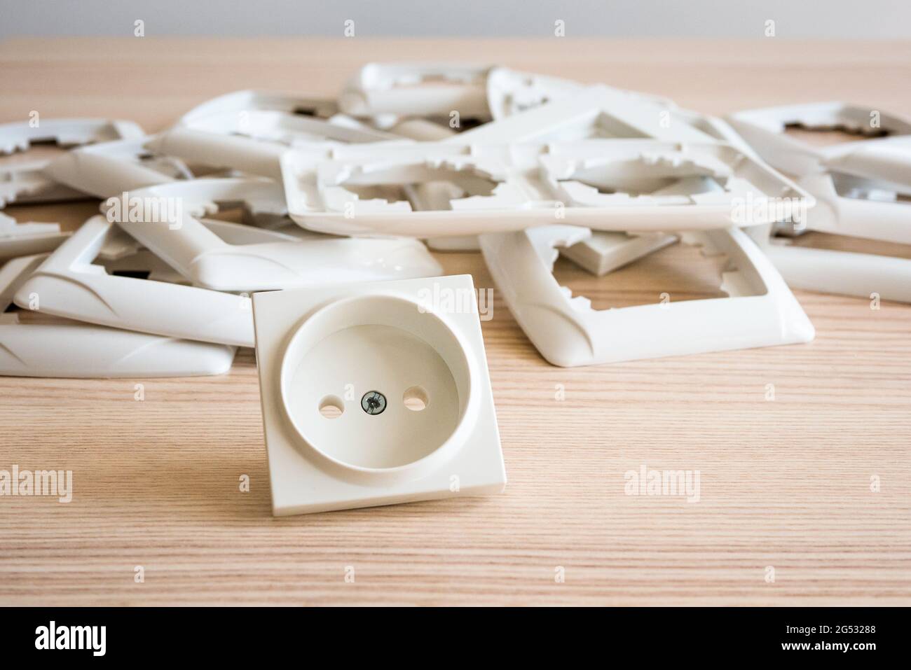 European power socket and the stack of socket frames Stock Photo - Alamy
