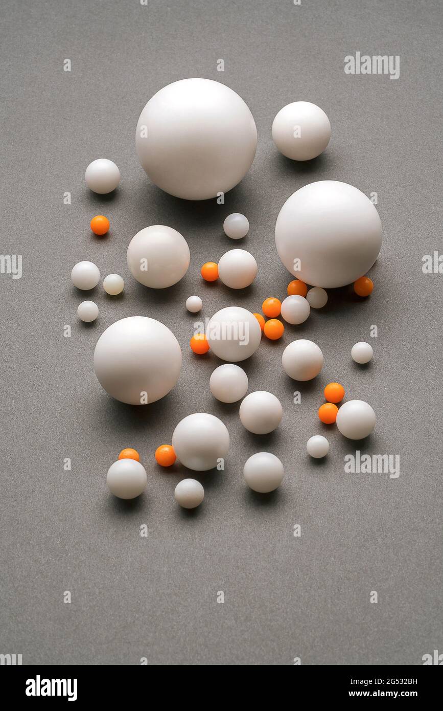 Closeup top view showing group of assorted ceramic balls in different ...