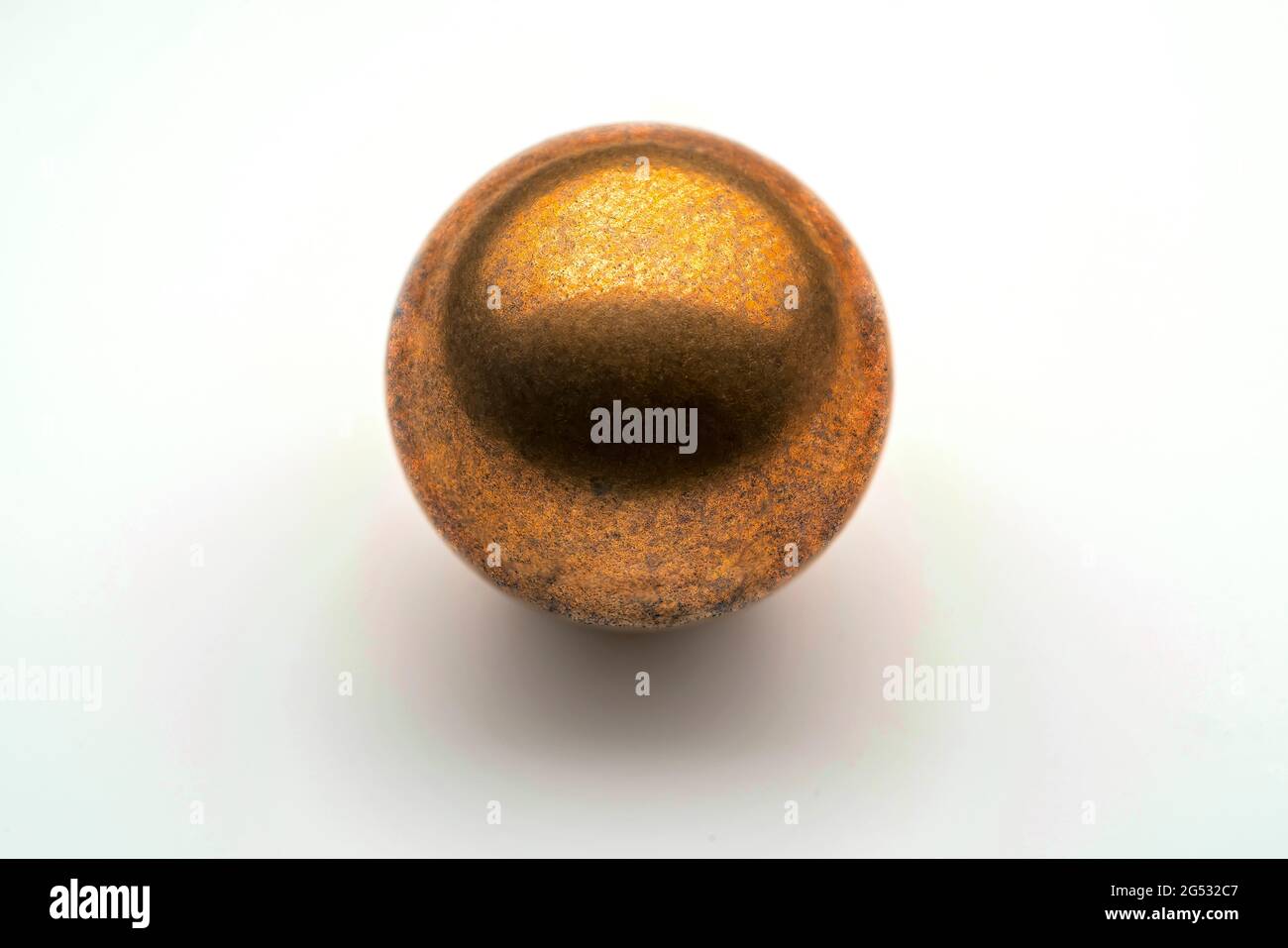 Close up view of large single industrial brass metal ball used in ...