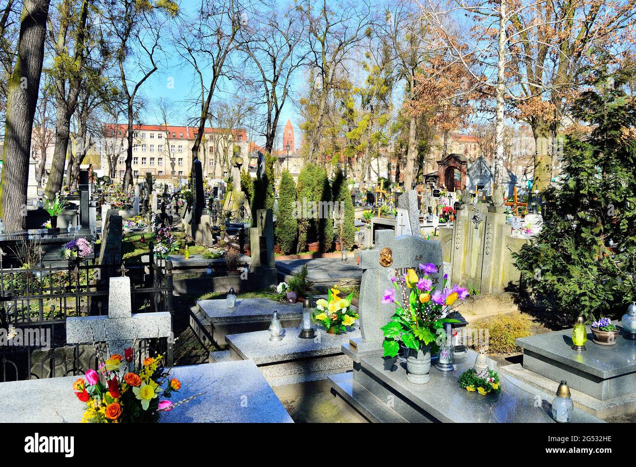 Graves in a Catholic cemetery by day. Summer Stock Photo - Alamy