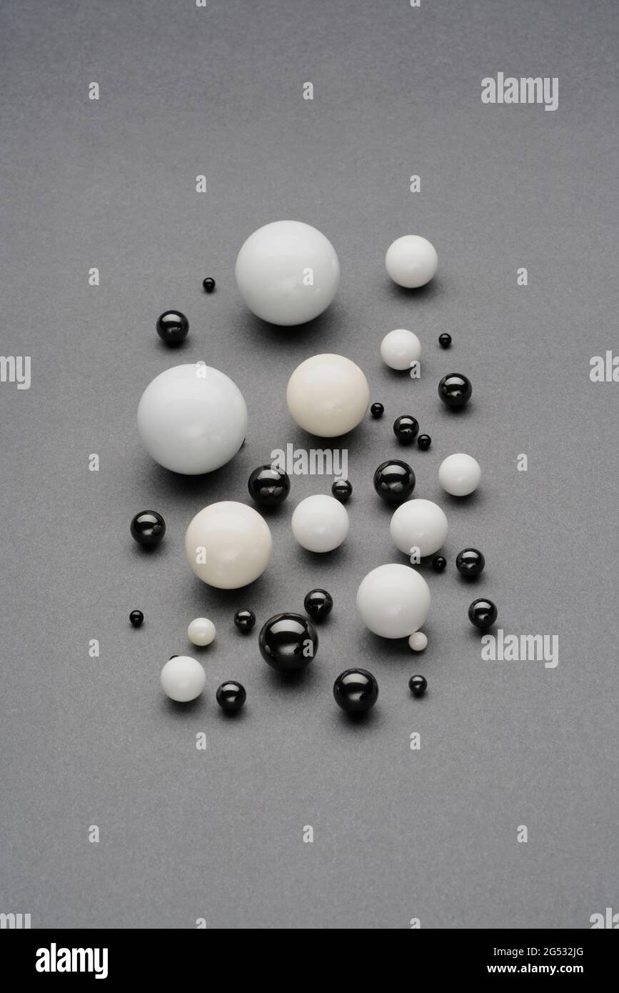 Closeup top view showing group of assorted industrial ceramic balls ...