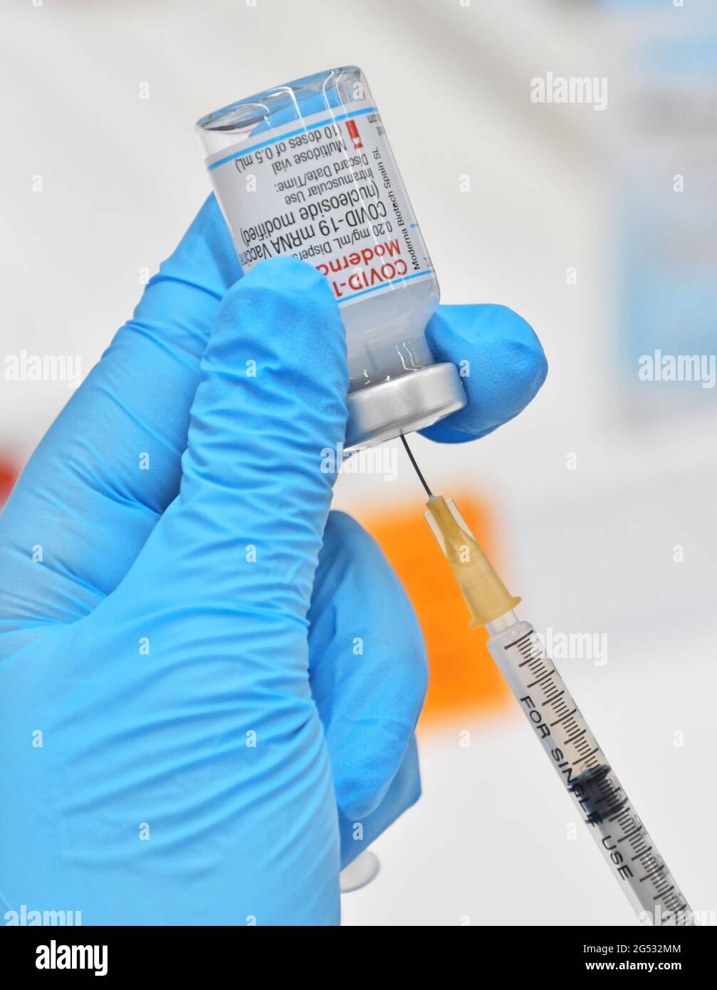 Osaka, Japan. 25th June, 2021. Medical Workers fill syringes with the ...