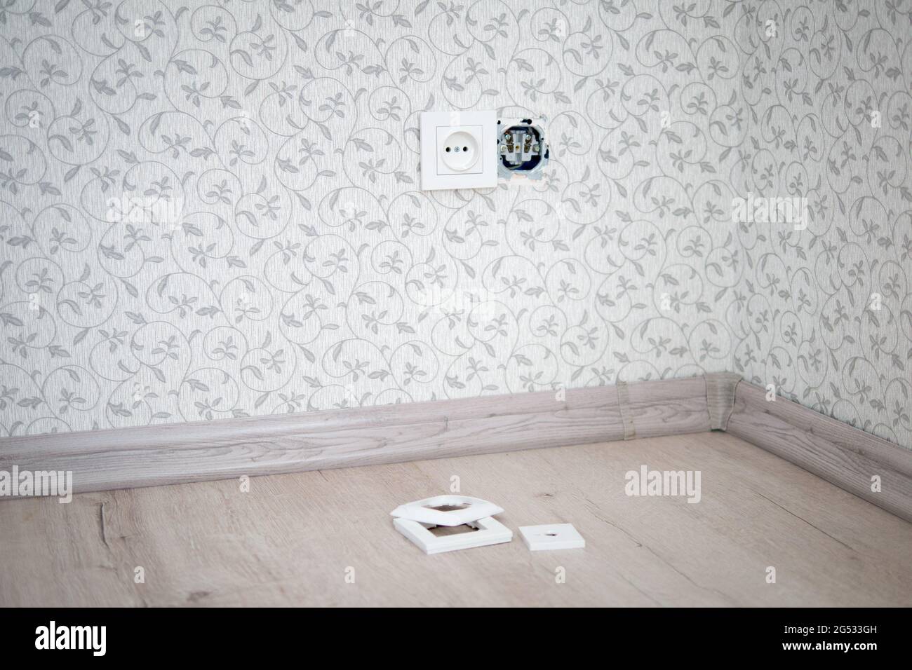 Unrepaired electrical outlet in the wall in the new apartment Stock ...