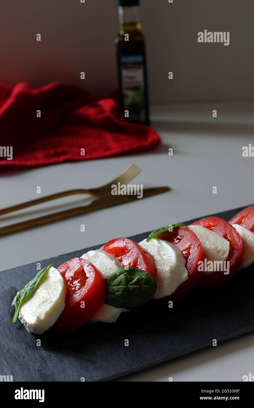 Italian style dinner, red and white Stock Photo - Alamy