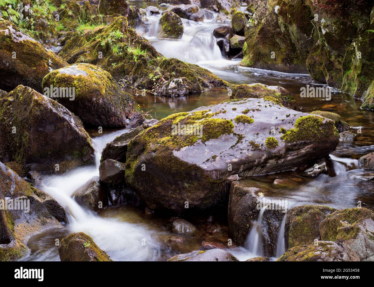 Water coursing along the stream at Watendlath,, lake district, UK Stock ...
