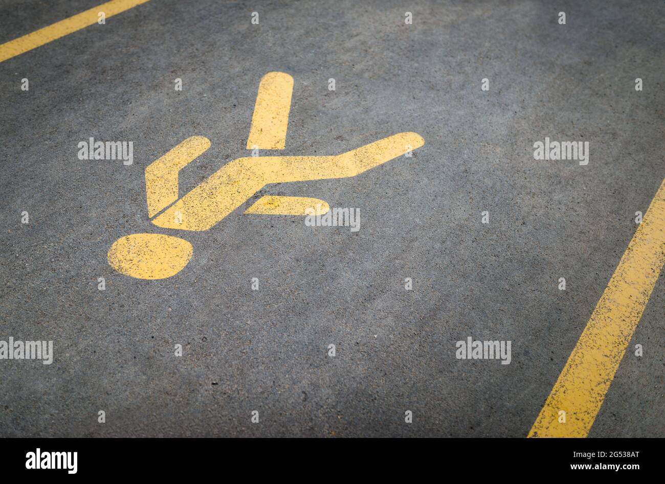 Pedestrian traffic road sign on asphalt surface Stock Photo - Alamy