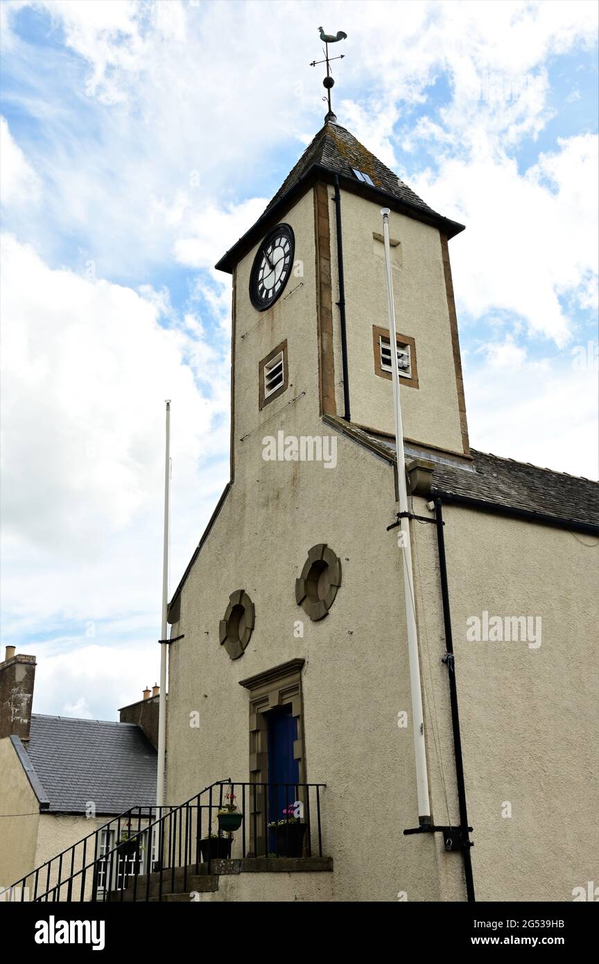 An exterior view of an old stone clock tower building in the Scottish ...