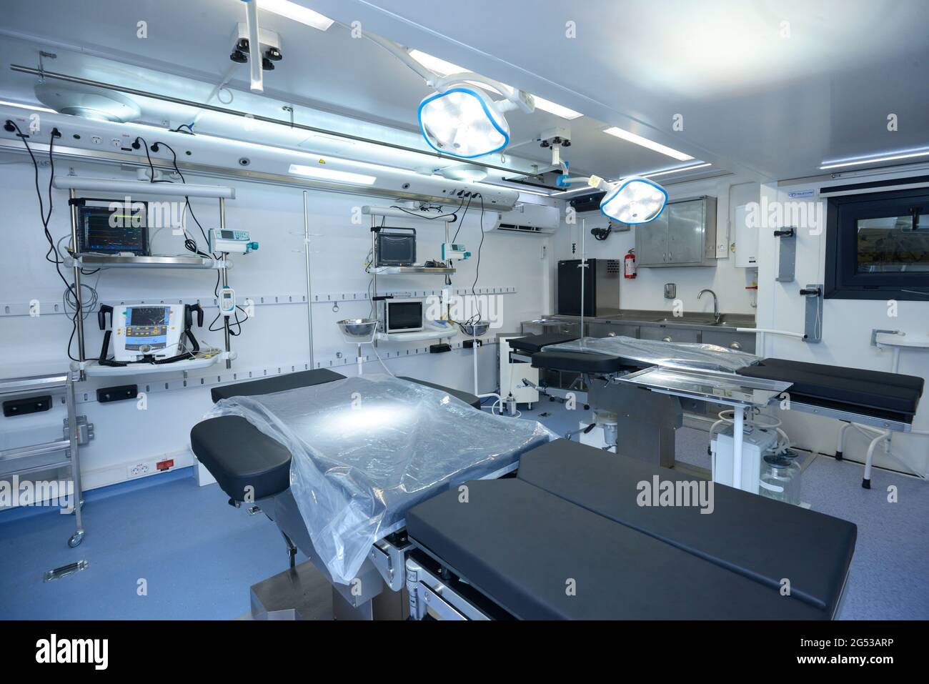 Interior of a new military mobile hospital operation tables, reviving ...