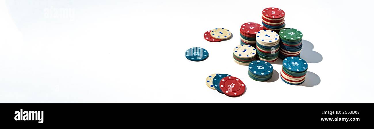 the simple abstract stack of casino chips on the color surface table ...