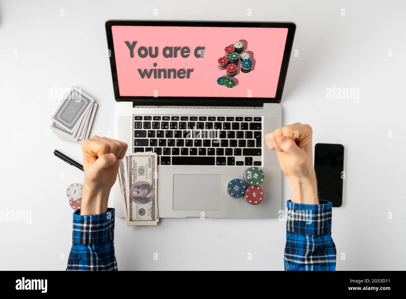 overhead person playing the gamble games online at home and win the ...