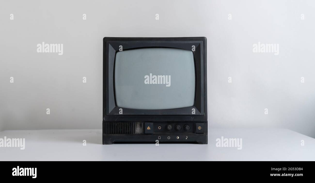 the old fashioned vintage tv television on the shelf at home Stock ...