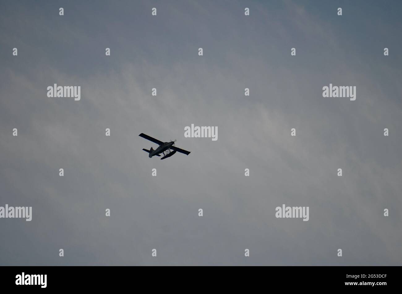 Seaplane flying in the sky Stock Photo - Alamy