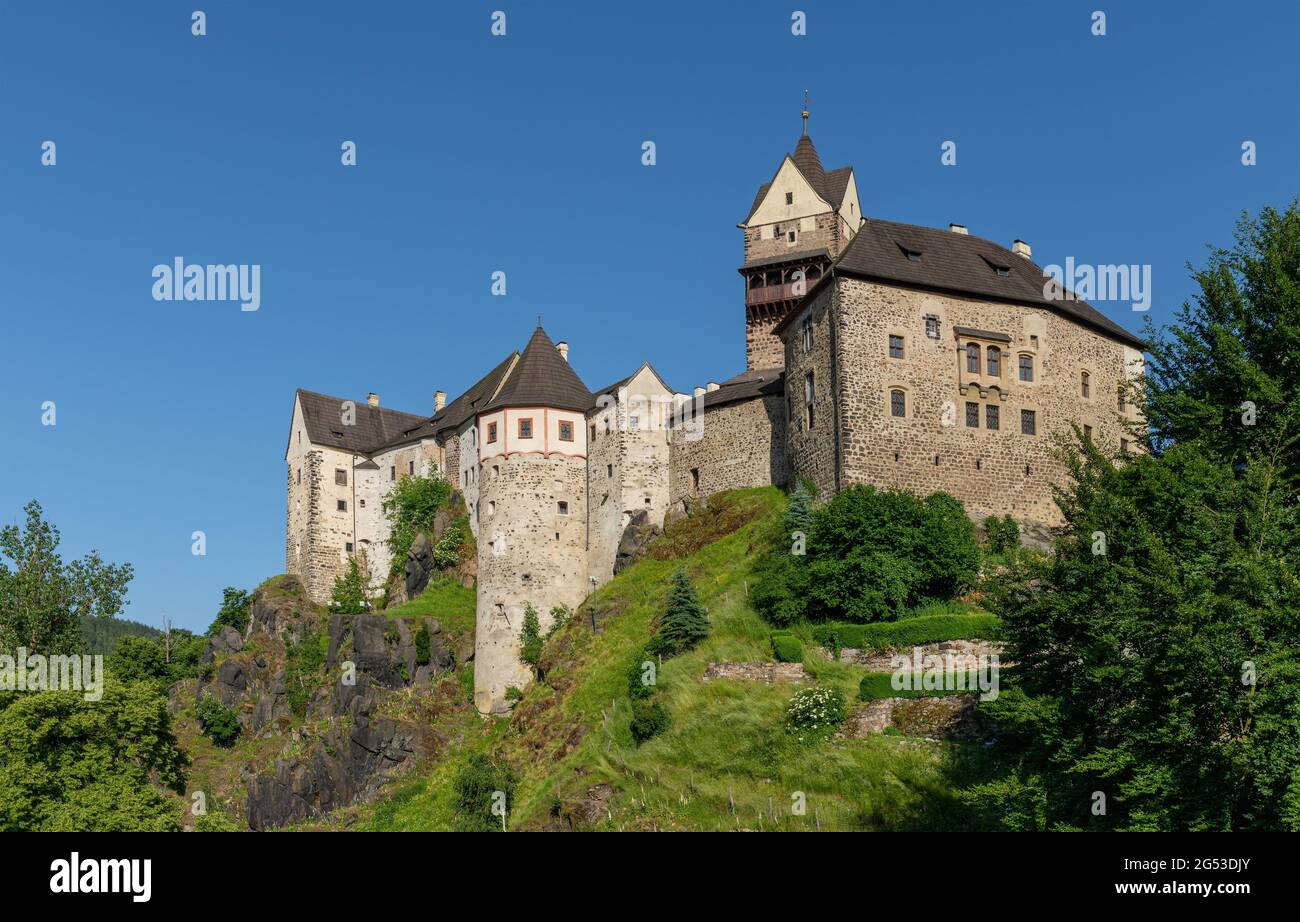 The medieval castle on a prominent rock promontory, surrounded on three ...