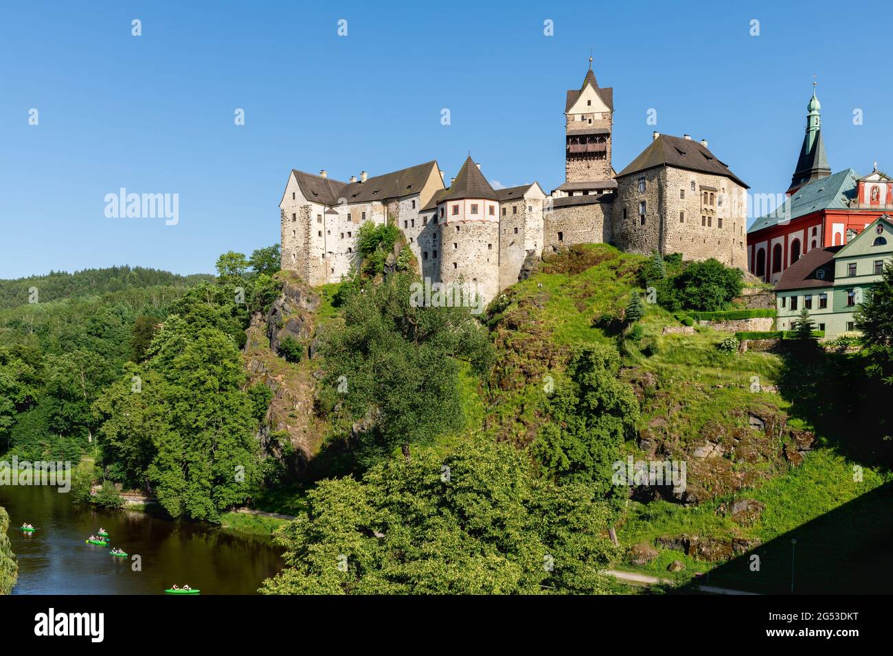 The medieval castle on a prominent rock promontory, surrounded on three ...