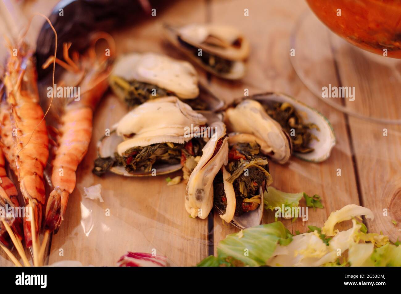 Fish snacks on wooden platter. Taste and pleasure. Fish restaurant ...