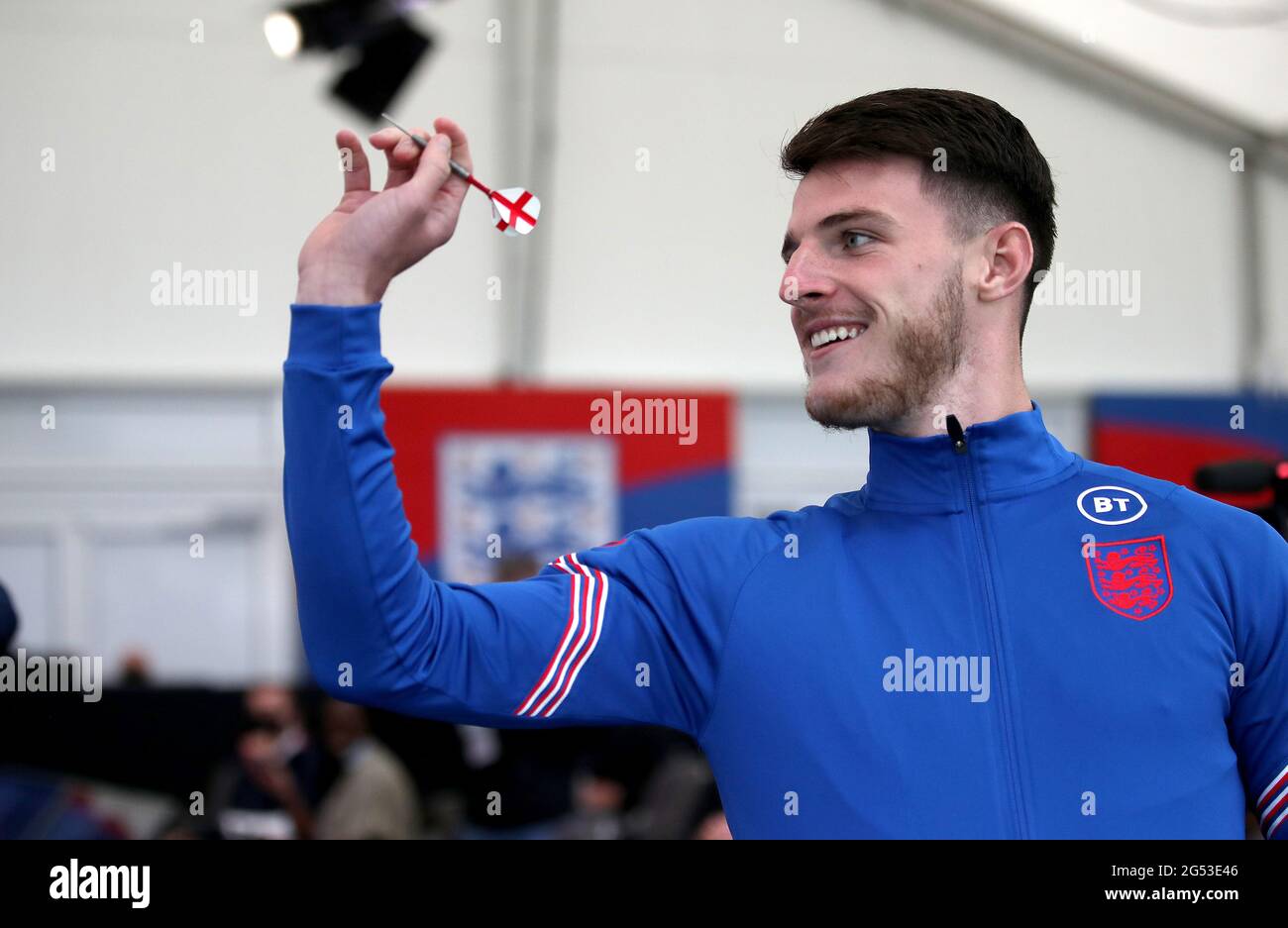 England's Declan Rice plays darts after a press conference at St George ...