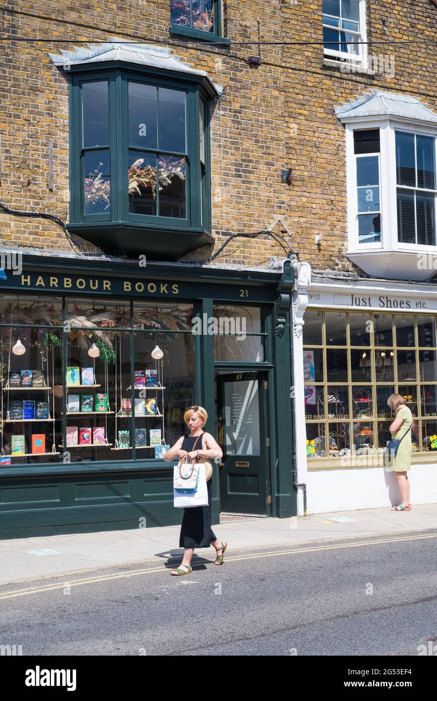 People out and about on a sunny Saturday outside Harbour Books and Just ...