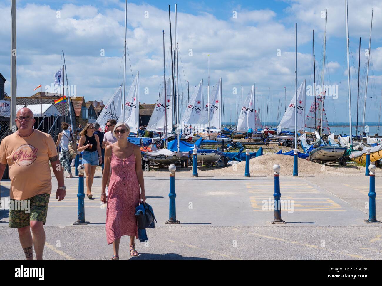 Sailing dinghies on the beach in front of the Whitstable Yacht Club ...