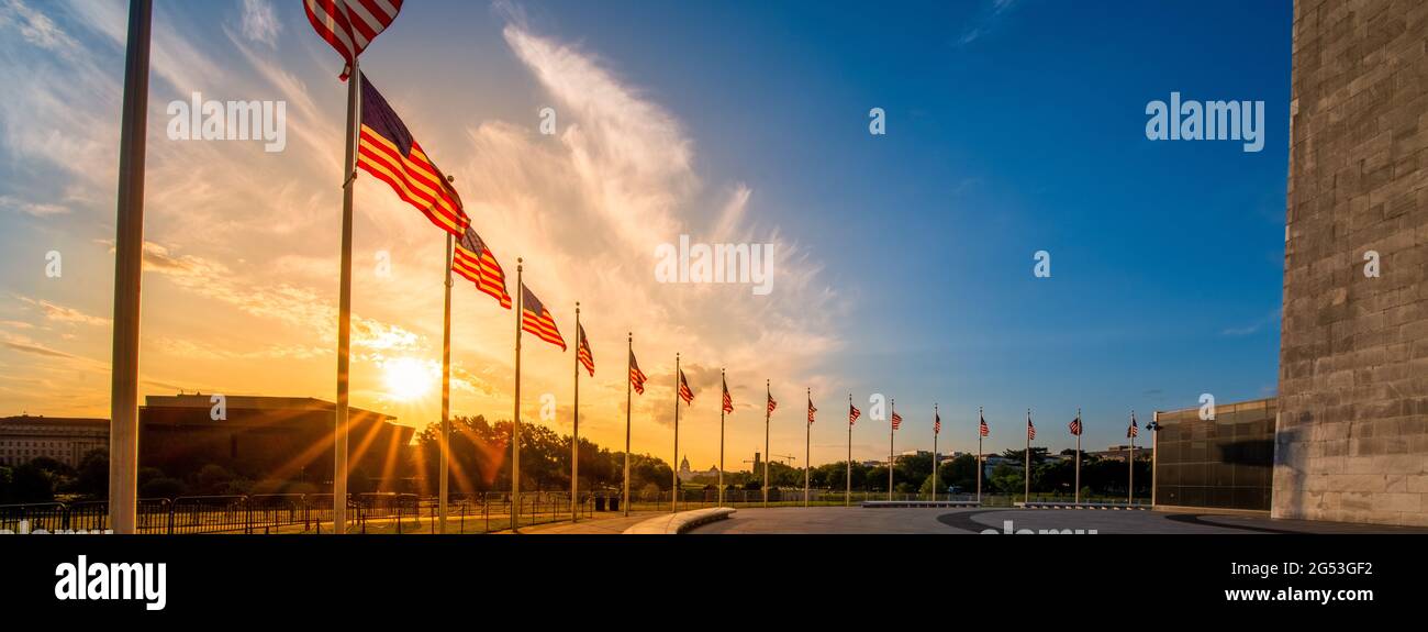 Sunrise over ring of American Flags around the Washington Monument in ...