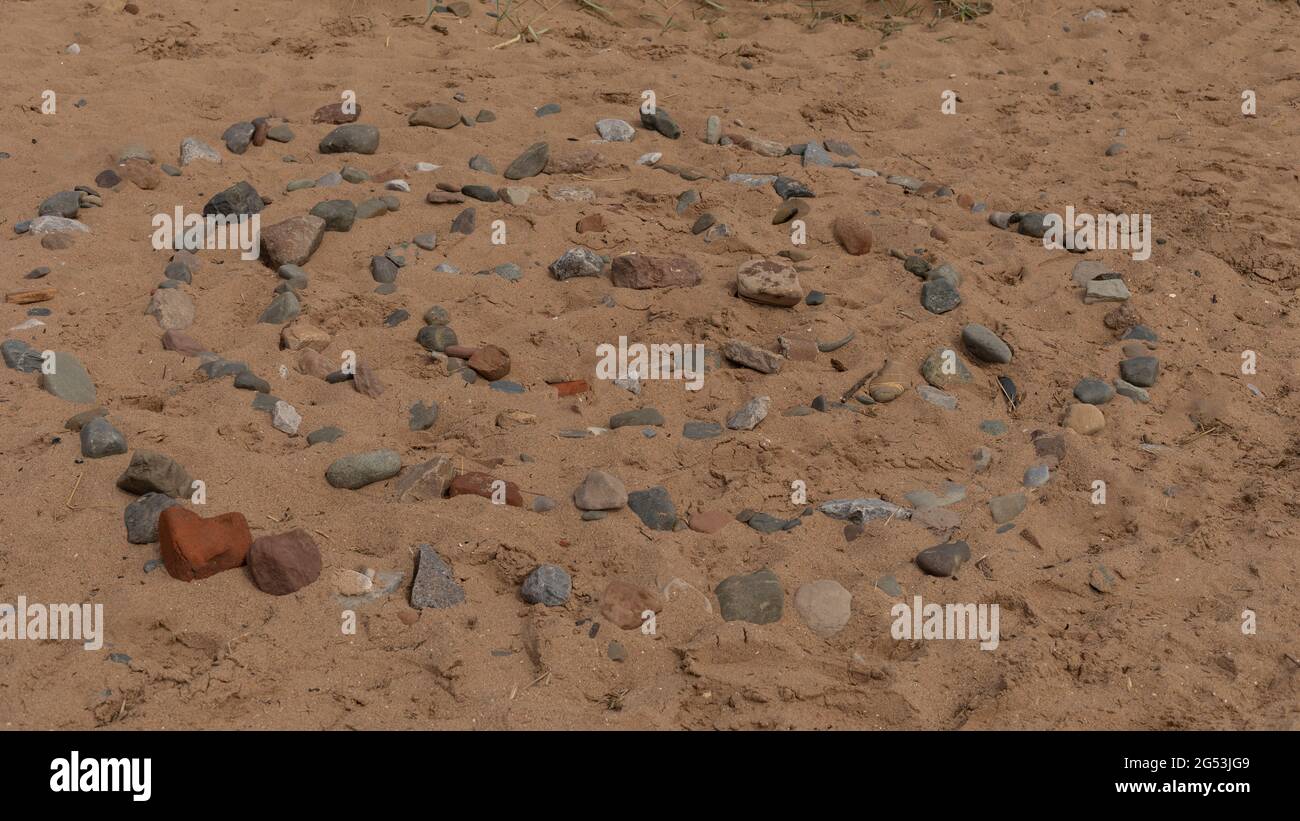 Stones sand beach circle hi-res stock photography and images - Alamy