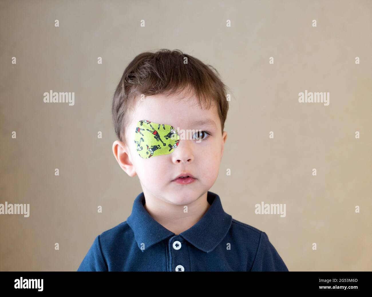 Boy with plaster on eye hi-res stock photography and images - Alamy