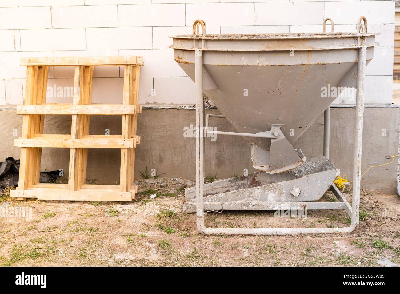 Hopper bucket for pouring concrete in large portions, gray Stock Photo ...