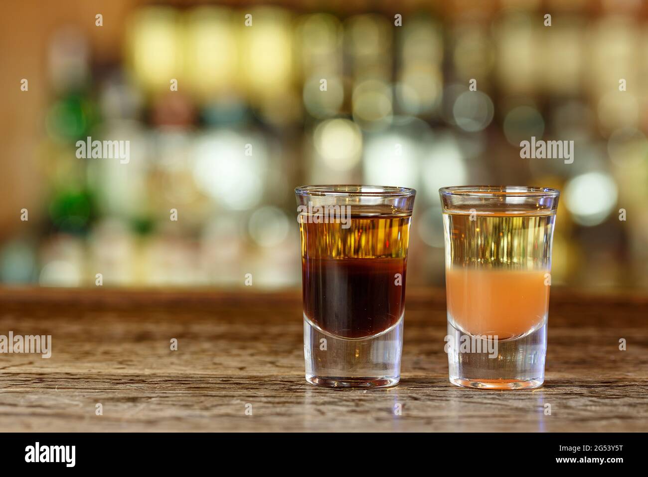 Two cocktails on the bar, cocktails based on whiskey and rum in the ...