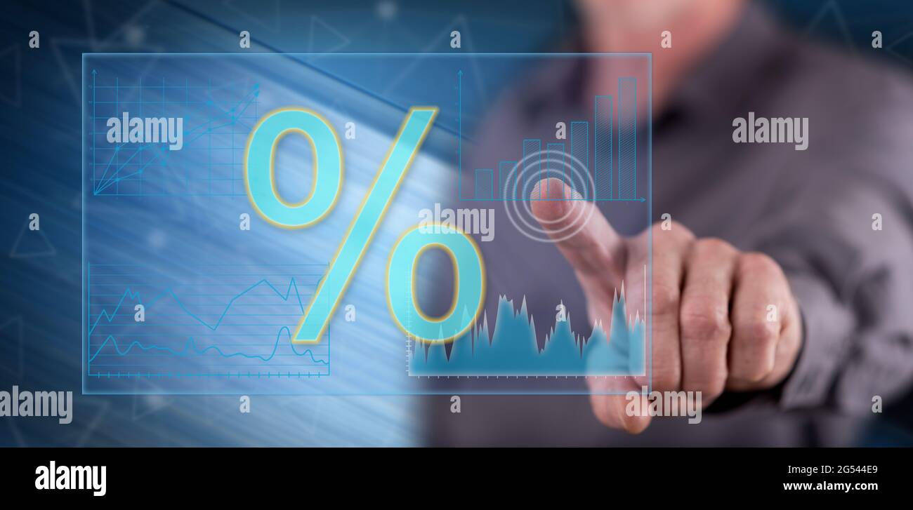 Man touching digital interest rates data on a touch screen with his ...