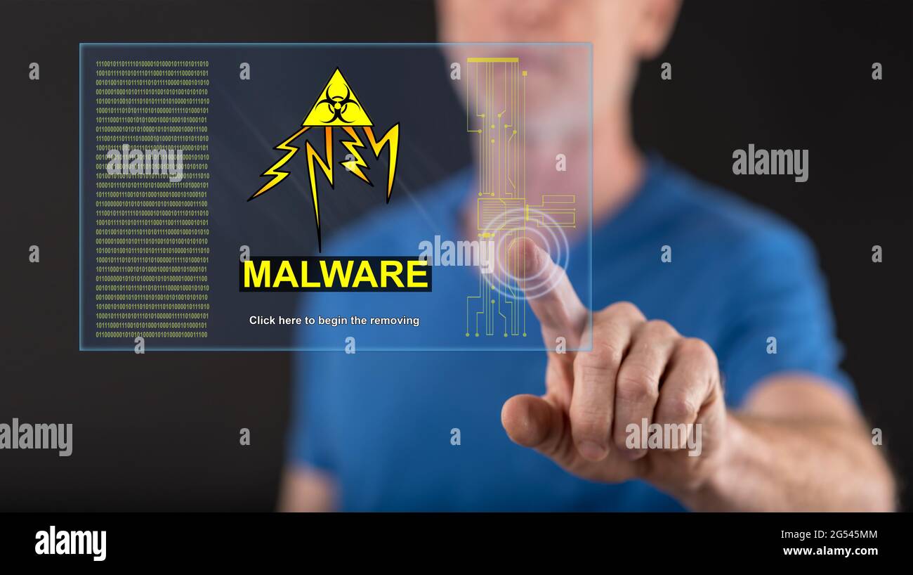 Man touching a malware concept on a touch screen with his finger Stock ...