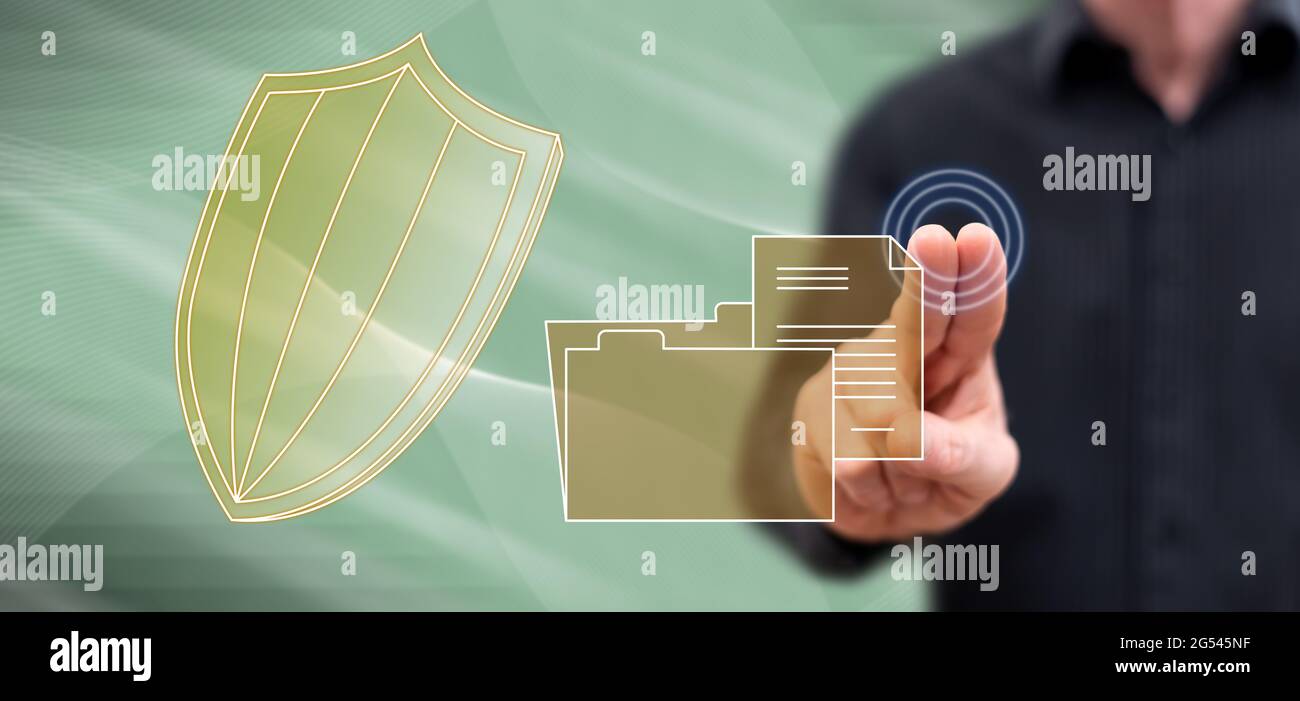 Man touching a data protection concept on a touch screen with his ...