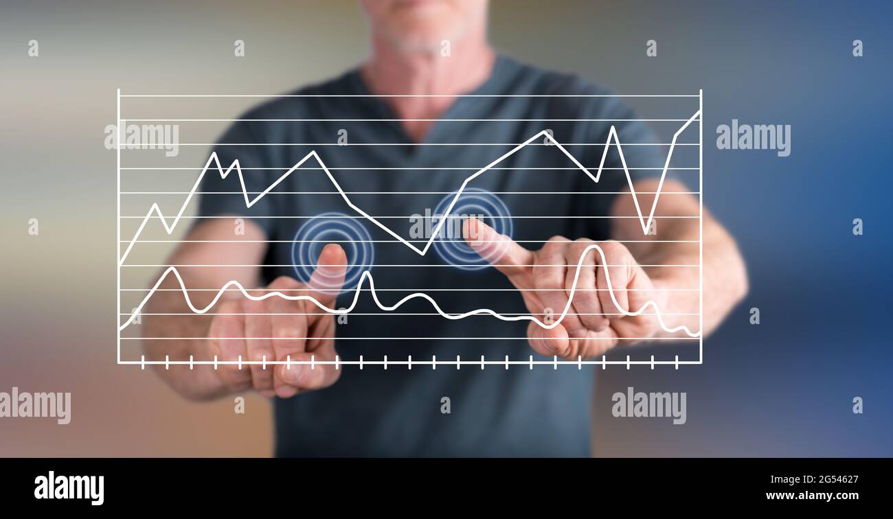Man touching business charts on a touch screen with his finger Stock ...