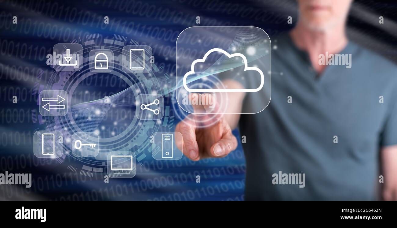 Man touching a cloud computing concept on a touch screen with his ...
