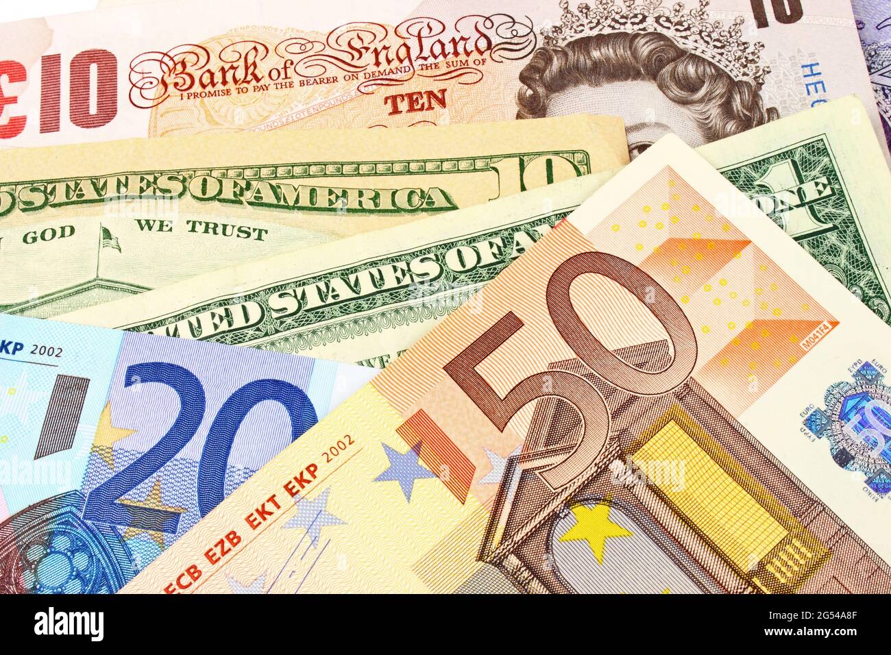 A selection of mixed currency notes from the UK, US and Euro areas ...