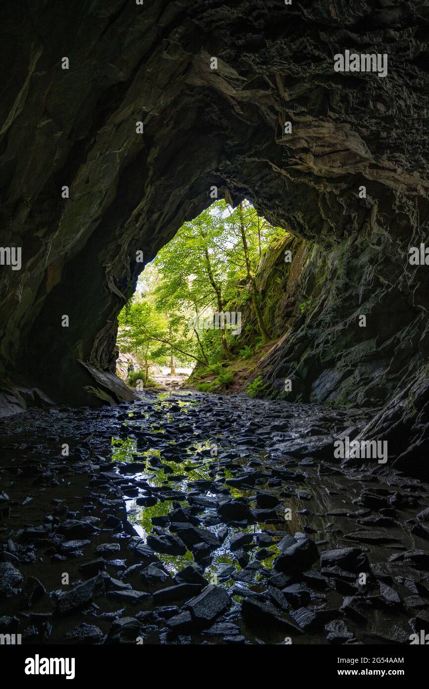 A view looking out from inside a cave at Rydal in the English Lake ...