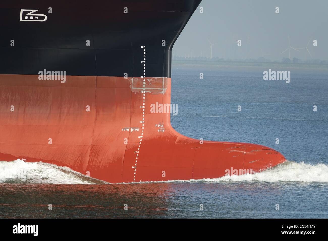 bulbous bow of a black container ship Stock Photo - Alamy