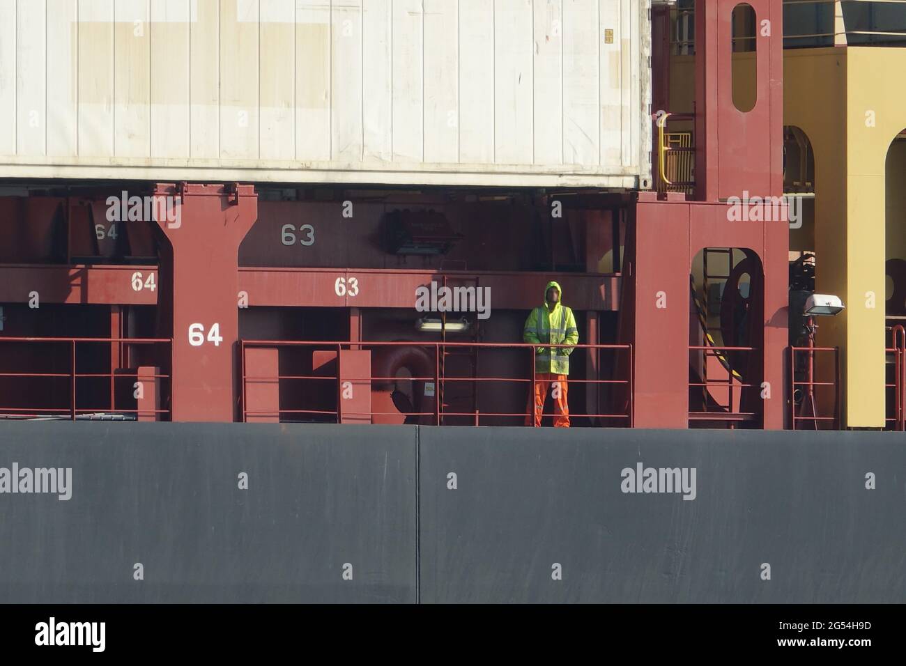 Container Bay with sailor Stock Photo - Alamy