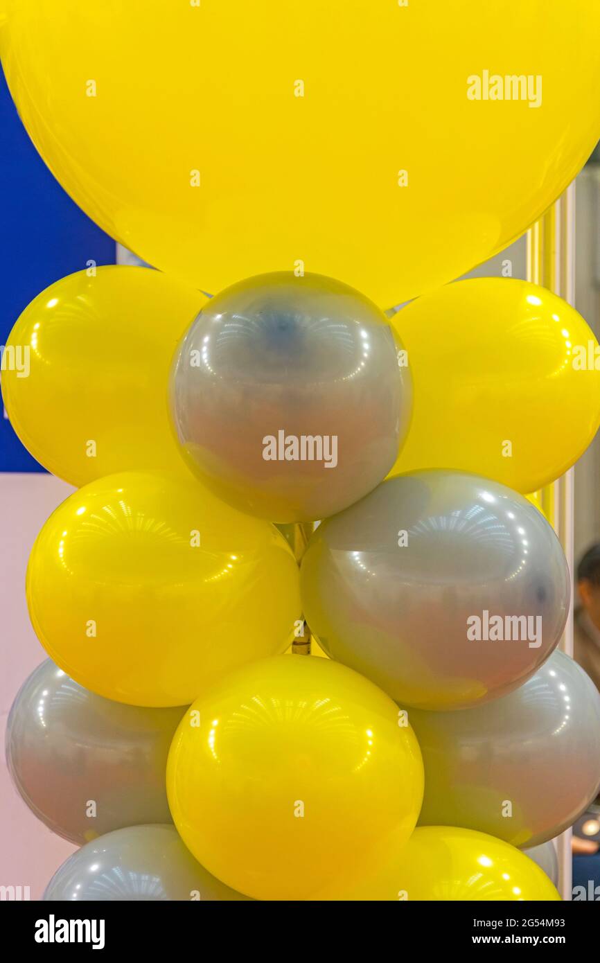 Yellow Party Latex Balloons Swirl Indoor Decor Stock Photo - Alamy