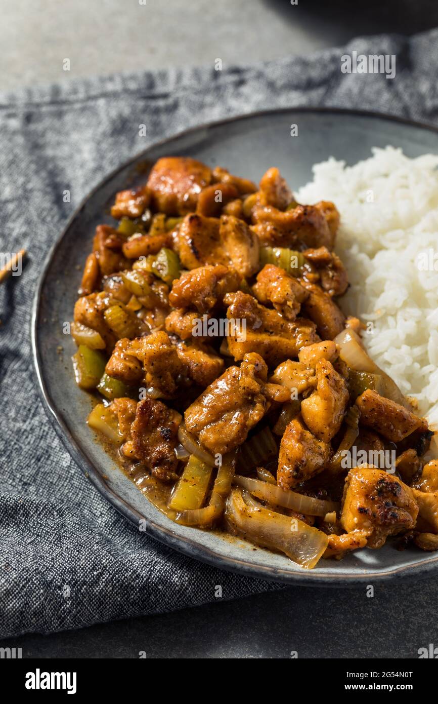 Homemade Asian Black Pepper Chicken with White Rice Stock Photo - Alamy