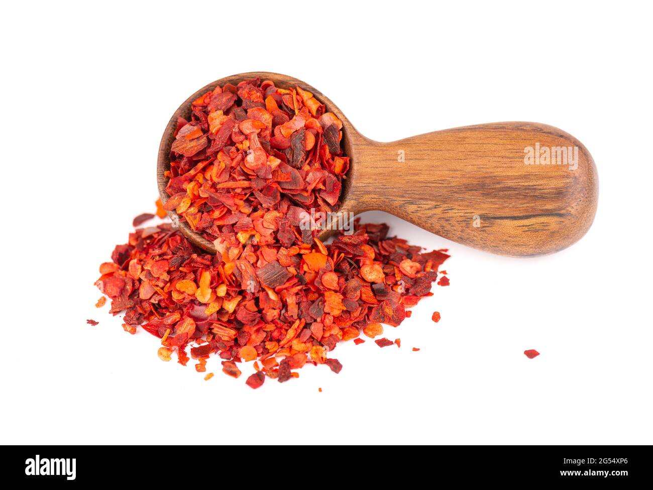 Dried red chili flakes in wooden spoon, isolated on white background ...
