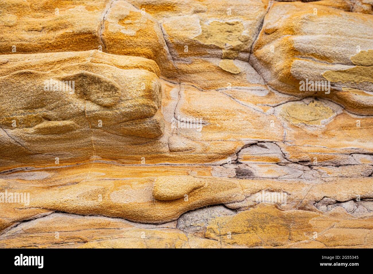 Close up of weathered and eroded sandstone rock on mountainside Stock ...