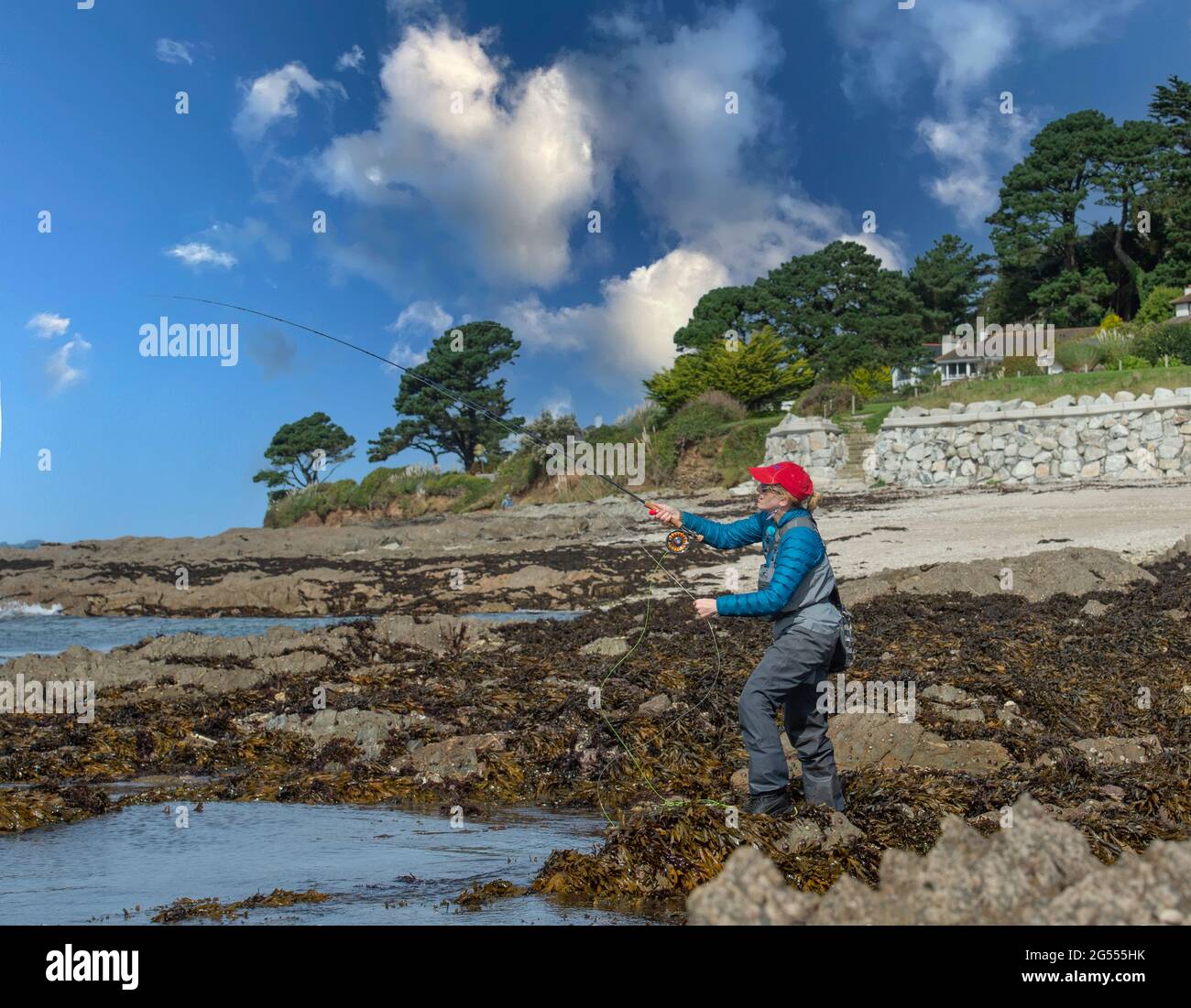 Fly fisherwoman casting fishing hi-res stock photography and images - Alamy
