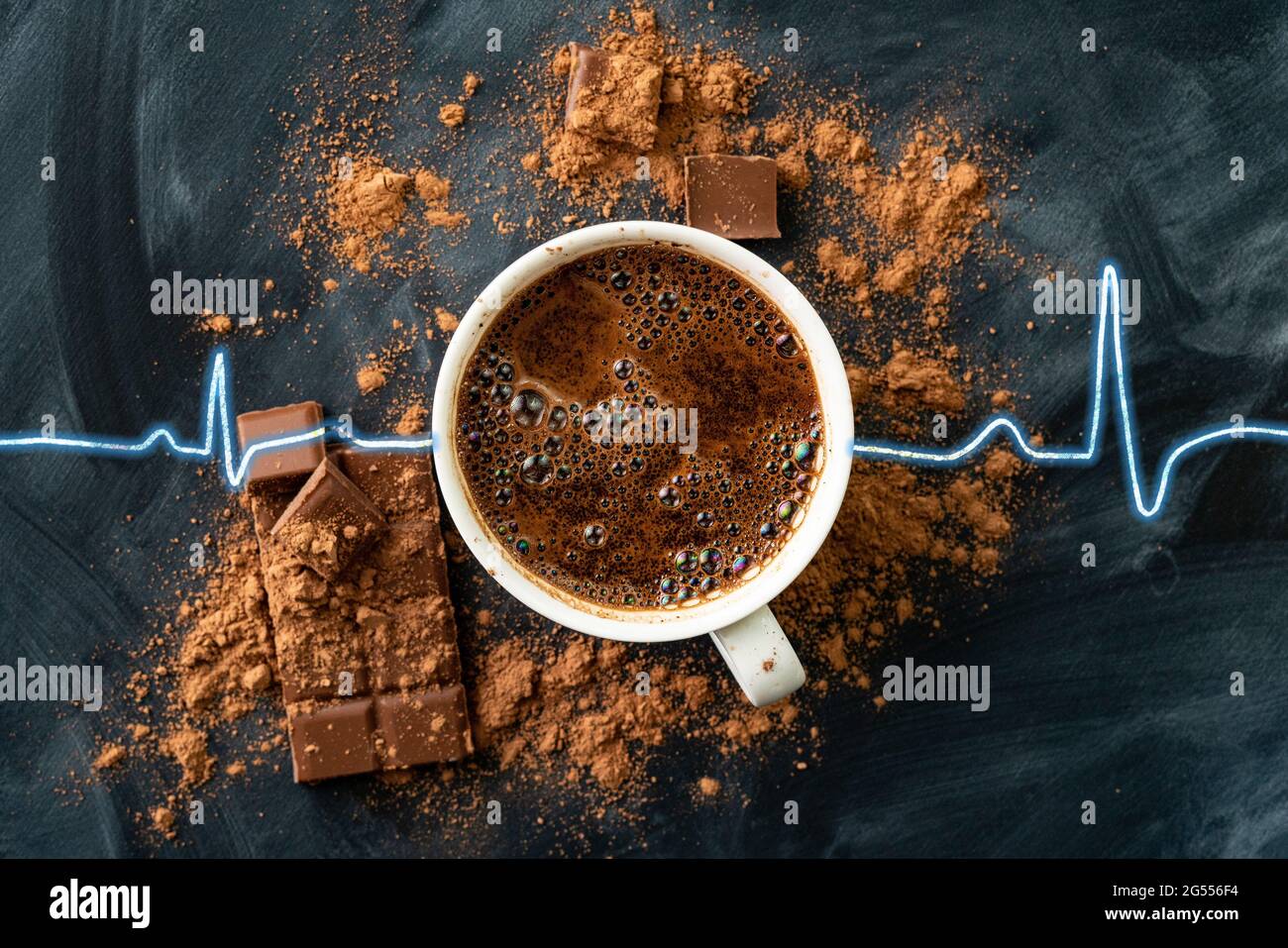 a top view of the hot coffee drink with the ekg electrodiagram lines or ...