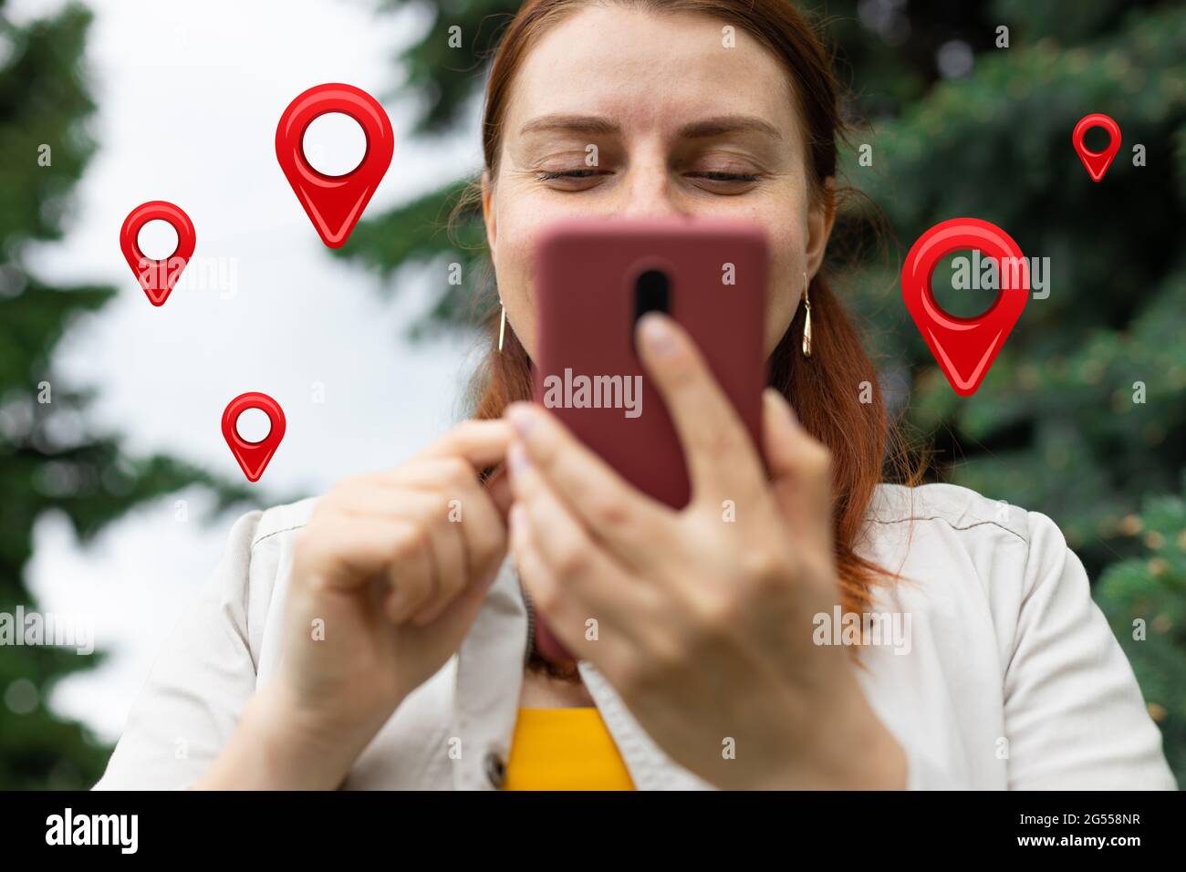 Traveler hands use map on mobile phone app to search for route location ...